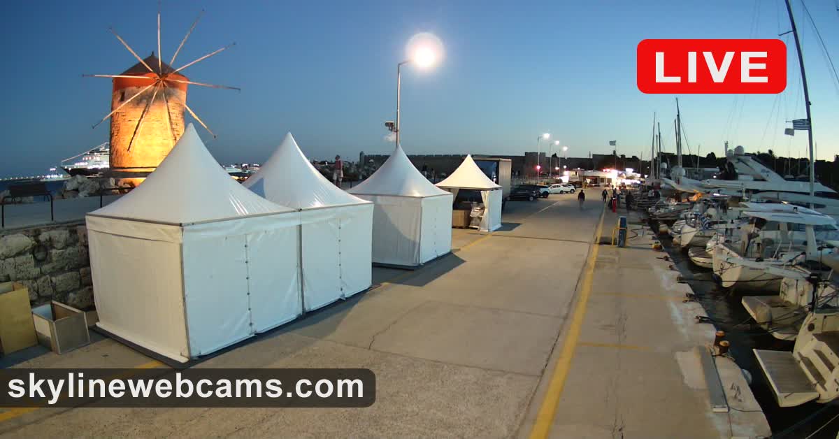 Live Cam Entrance to Mandraki Harbor and Windmills | SkylineWebcams